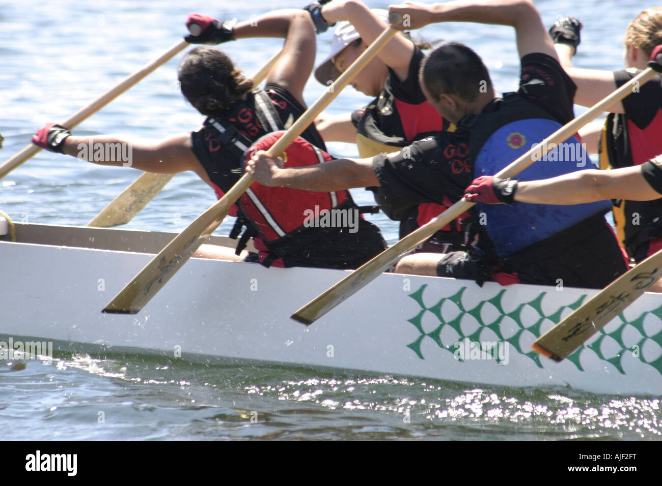 dragon boat team racing Stock Photo - Alamy