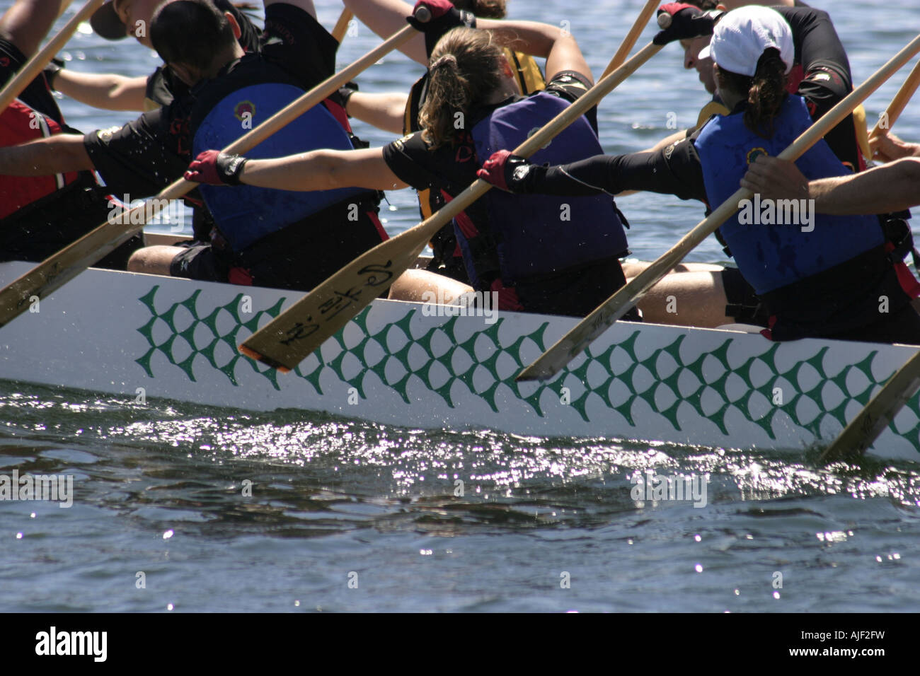 dragon boat team racing Stock Photo - Alamy