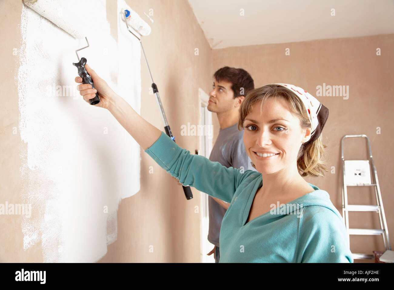 Using paint rollers hi-res stock photography and images - Alamy