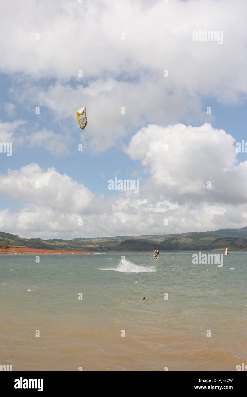 Kite boarding in Costa Rica lake Arenal Stock Photo - Alamy