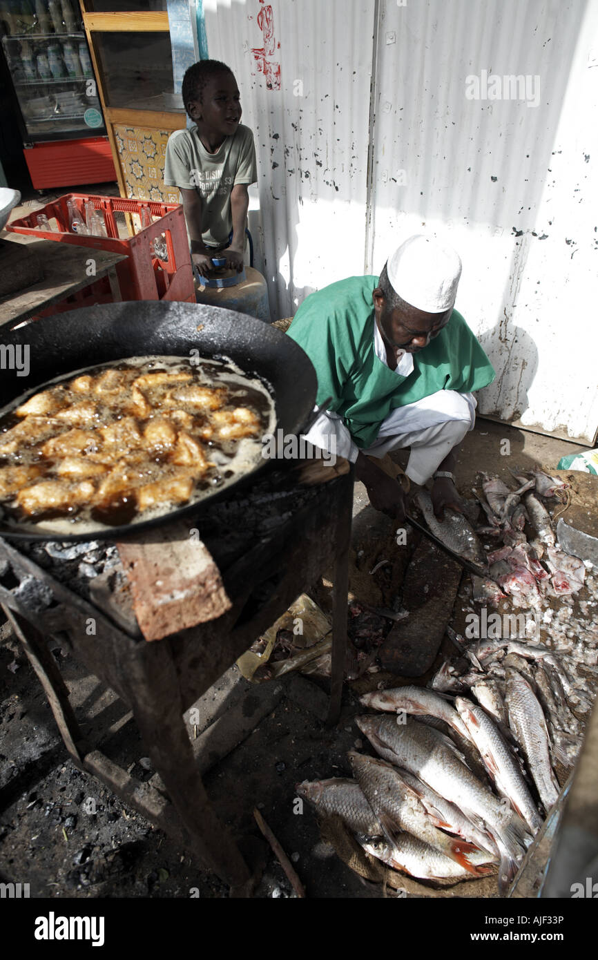 Cooking fish in the town of Dongola Stock Photo - Alamy