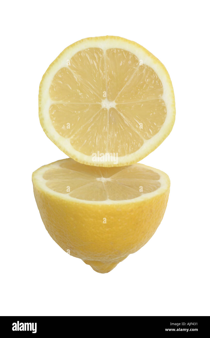 Lemon cut into two halves on a white background Stock Photo - Alamy