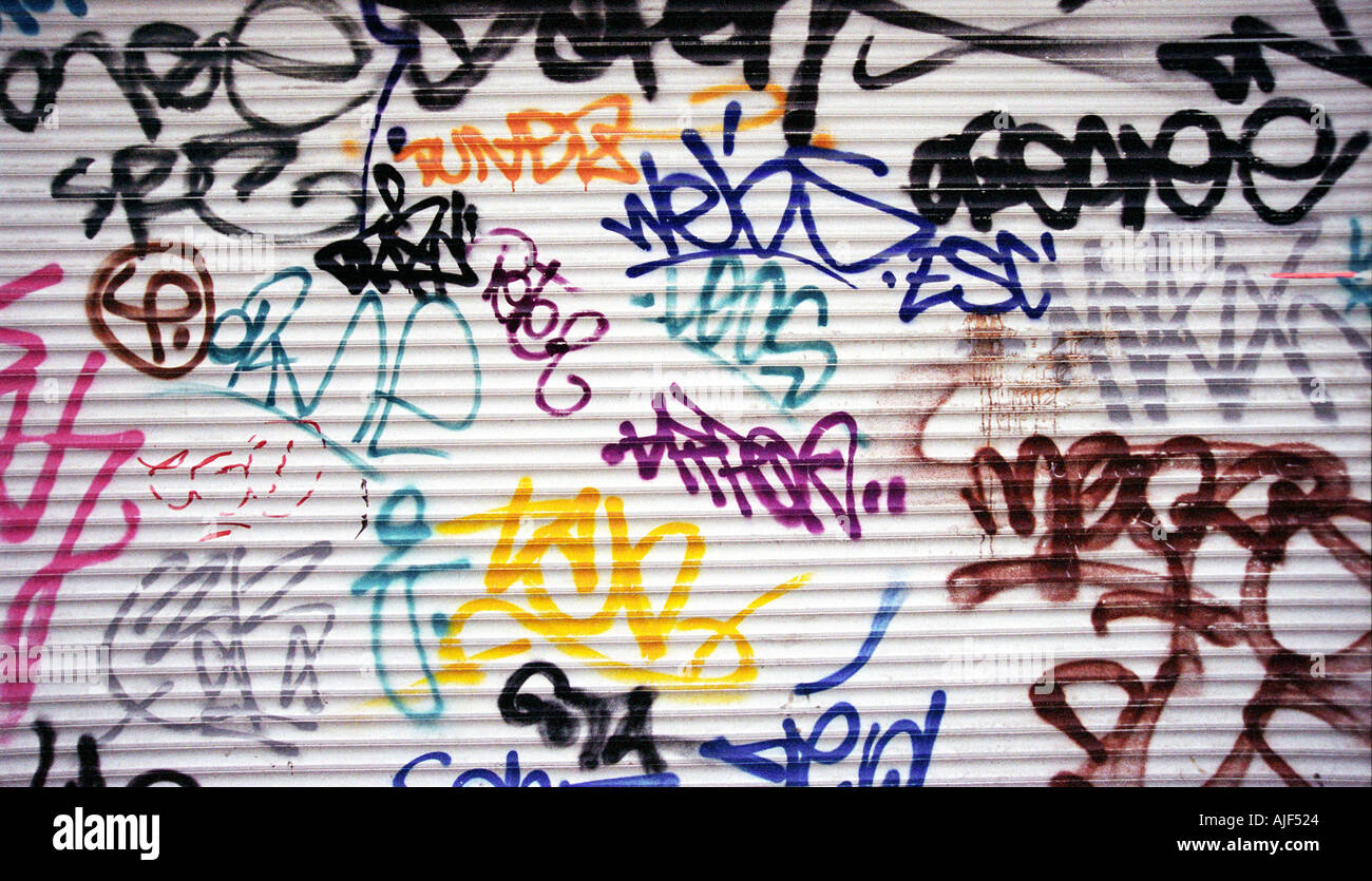Graffiti on a garage door Stock Photo - Alamy