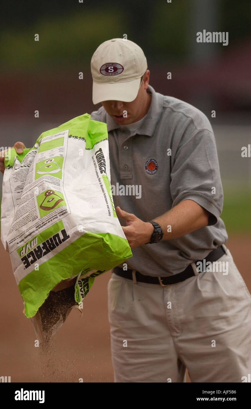 Field crew does maintenance to the baseball field between games Stock ...