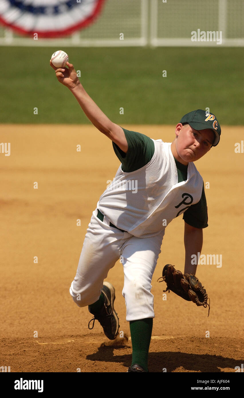 Youth baseball game action Stock Photo - Alamy
