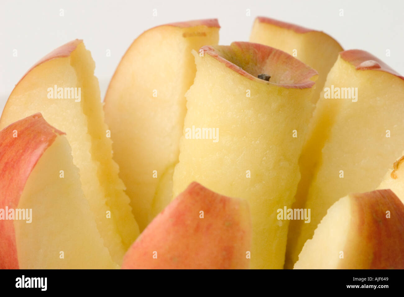 Apple sliced by apple slicer Stock Photo - Alamy