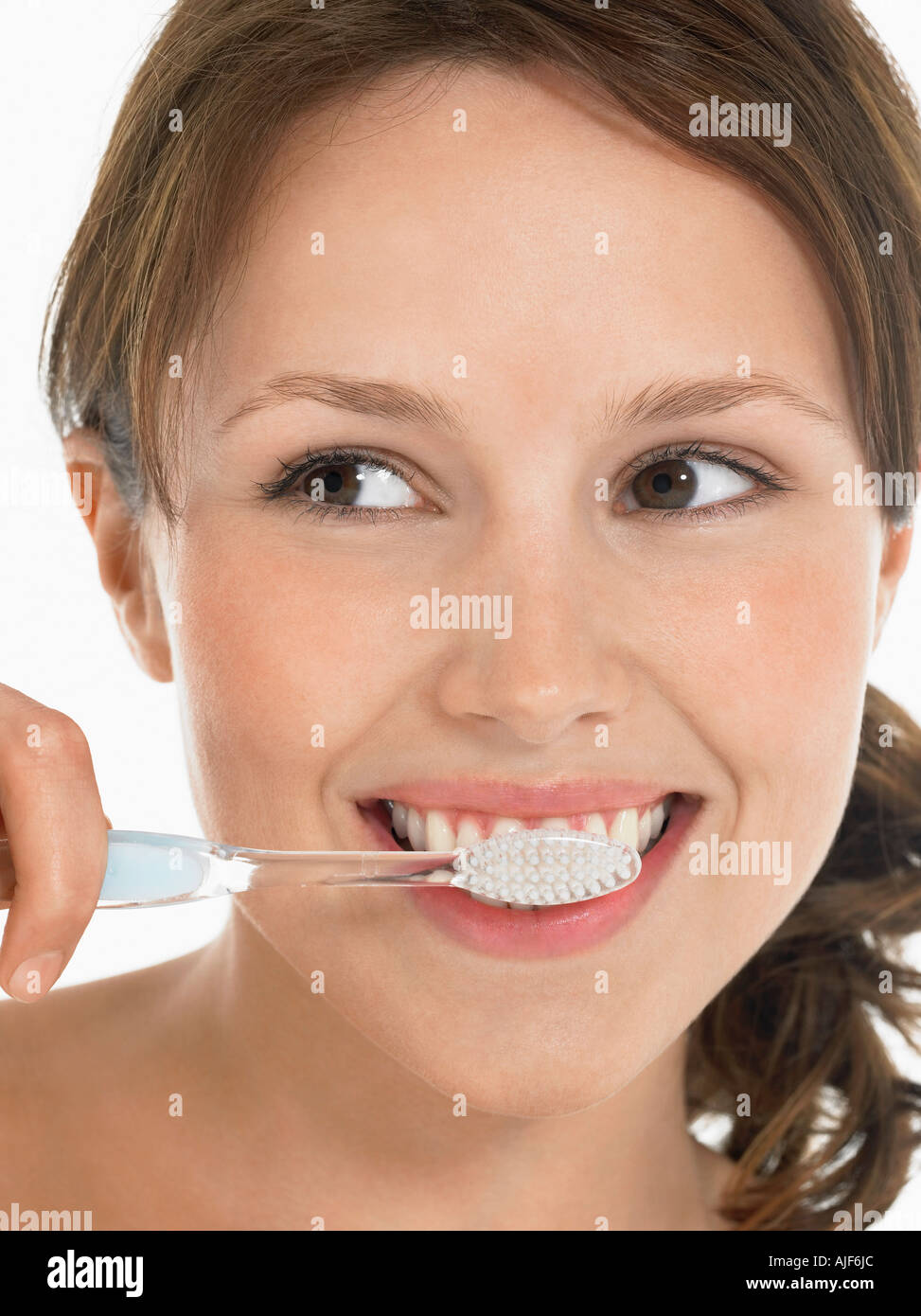 Young Woman Brushing Teeth, close up, head shot Stock Photo - Alamy