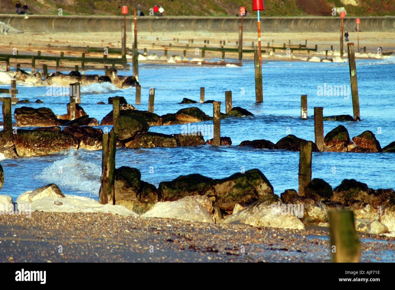 Water breaks on the sea shore Stock Photo - Alamy