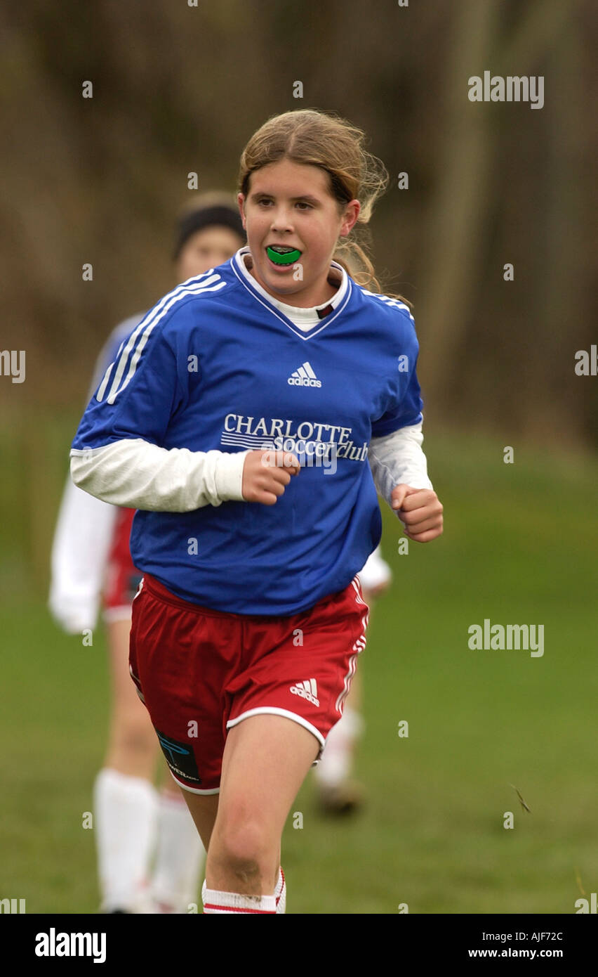 Youth girl s football action American soccer game Stock Photo - Alamy