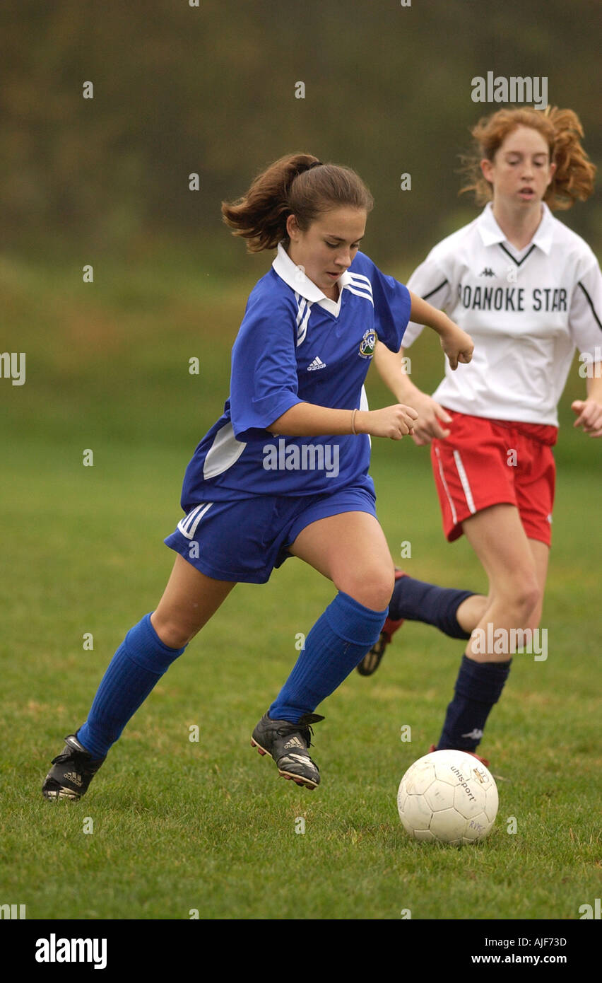 Youth girl s football action American soccer game Stock Photo - Alamy