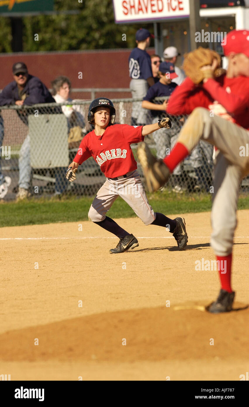 Youth baseball game action Stock Photo - Alamy