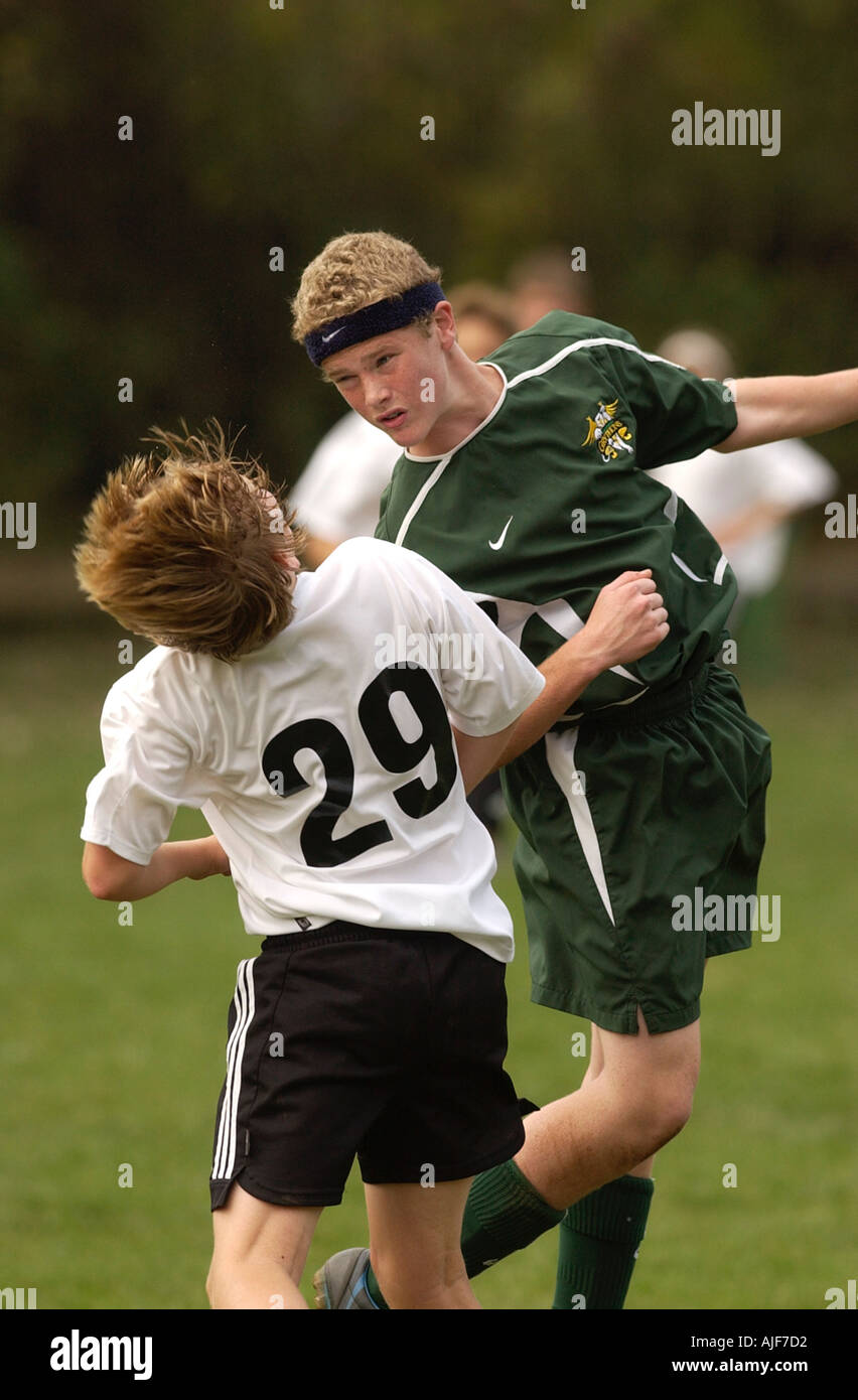 Youth boy s football action American soccer Stock Photo - Alamy