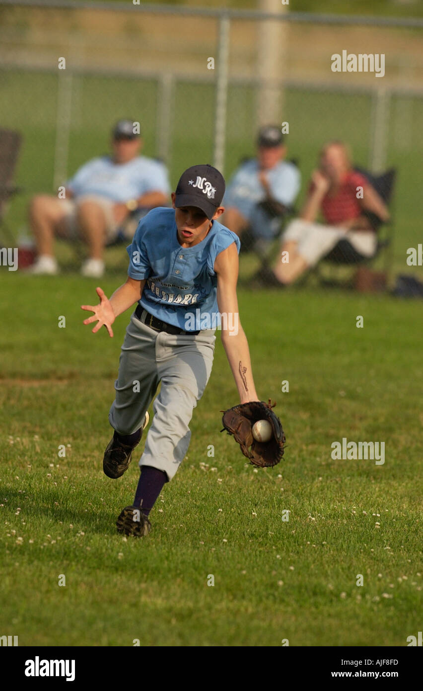 Youth baseball game action Stock Photo - Alamy