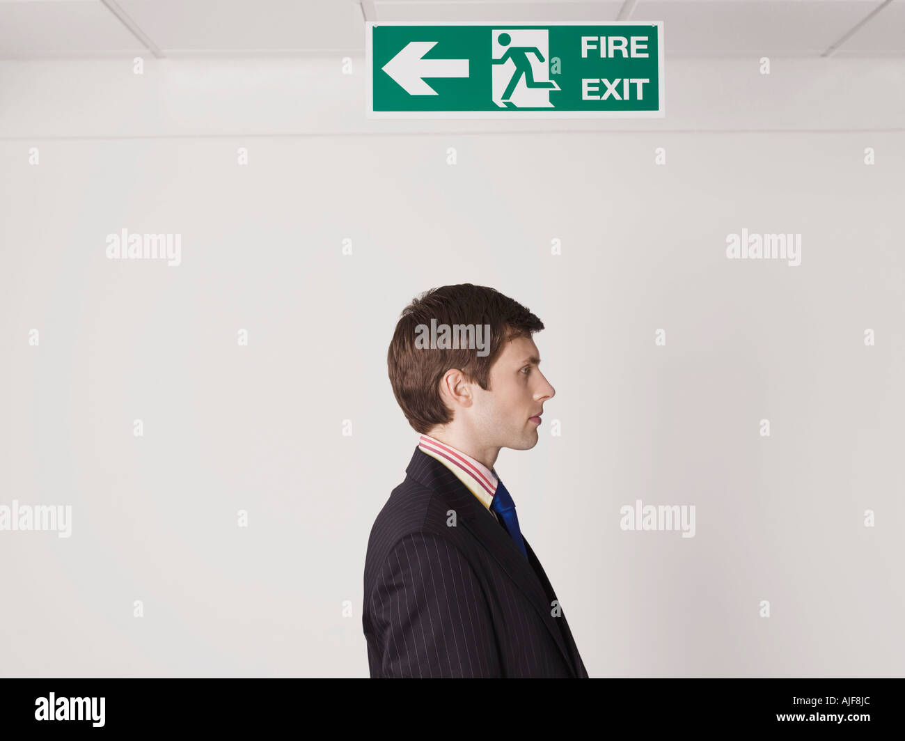 Standing under exit sign hi-res stock photography and images - Alamy