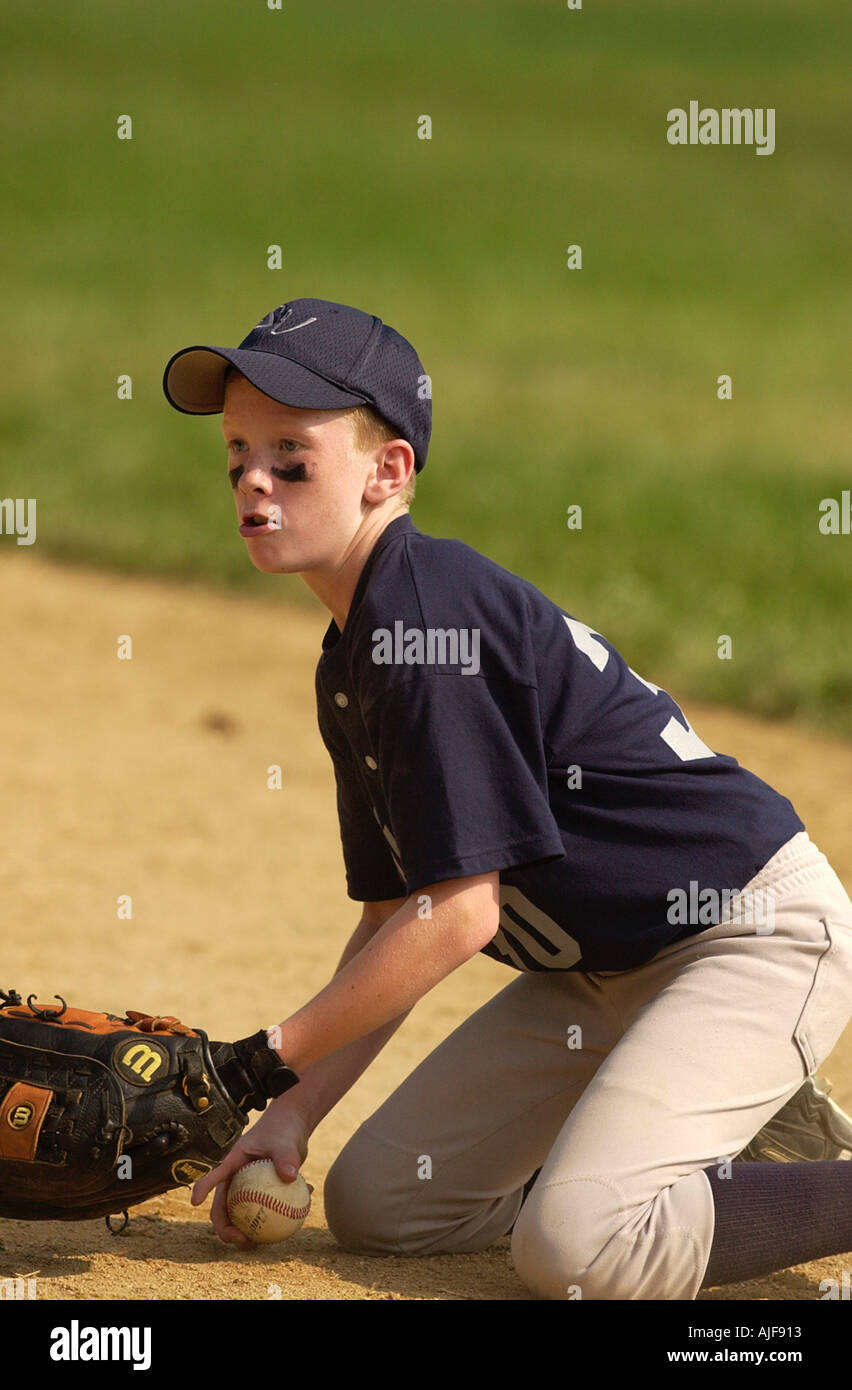 Youth baseball action Stock Photo - Alamy