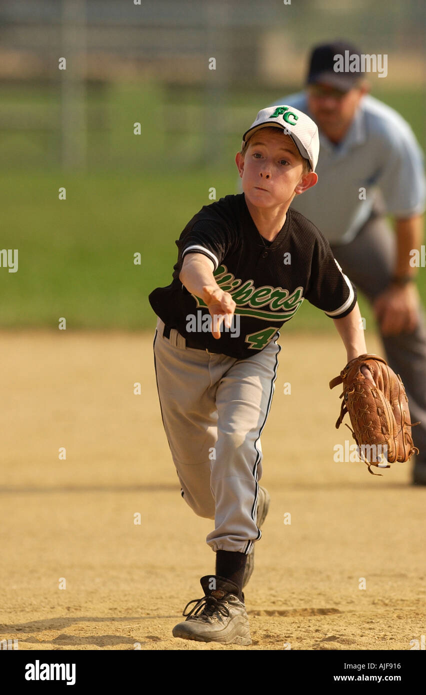 Youth baseball action Stock Photo - Alamy
