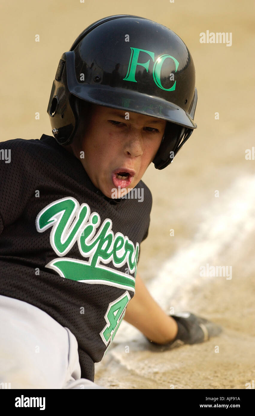 Youth baseball action Stock Photo - Alamy