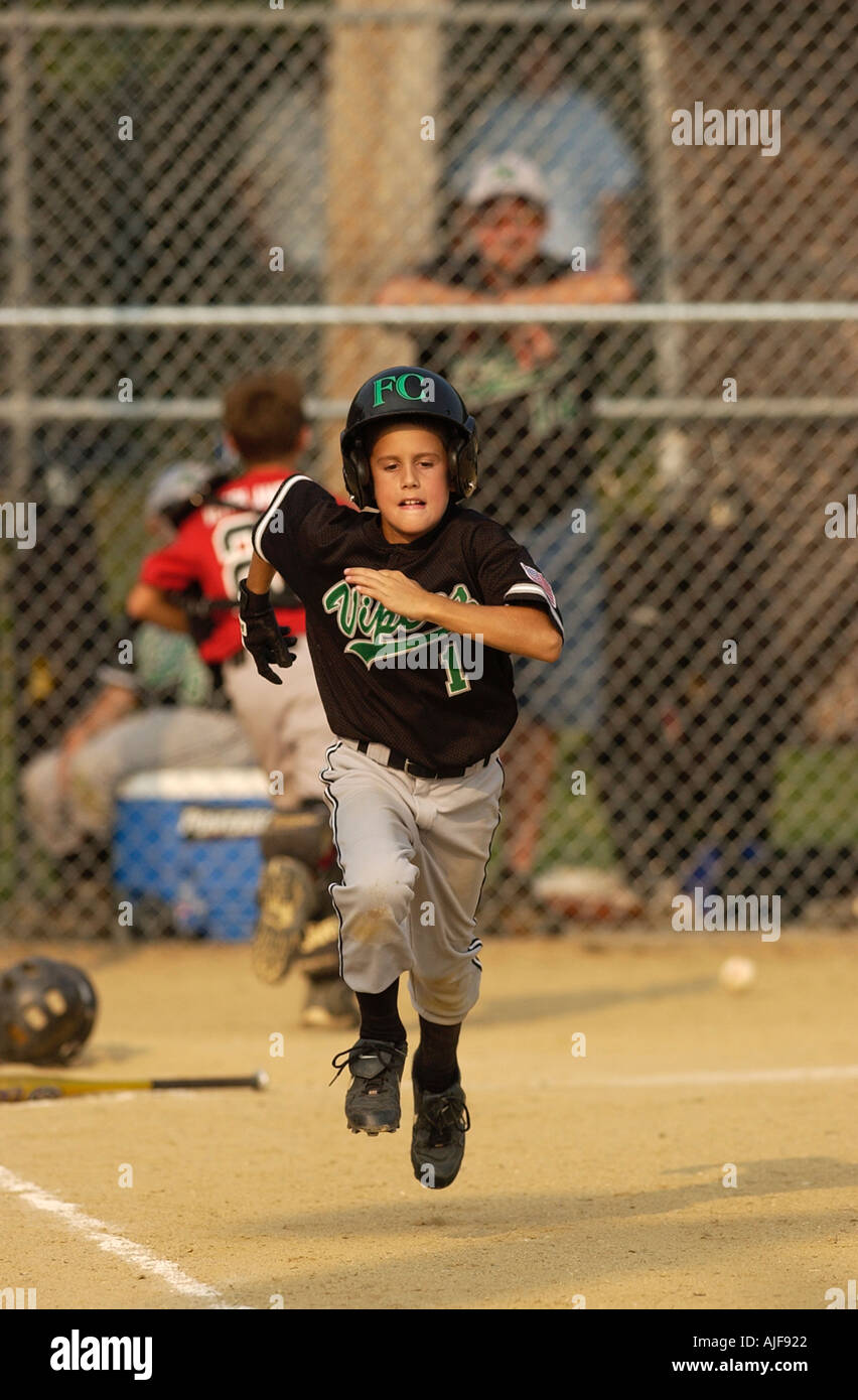 Youth baseball action Stock Photo - Alamy