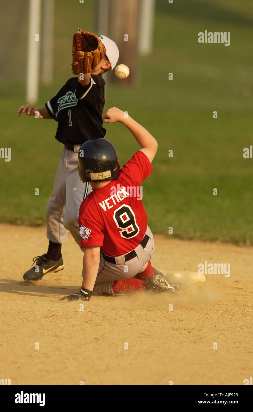 Youth baseball action Stock Photo - Alamy