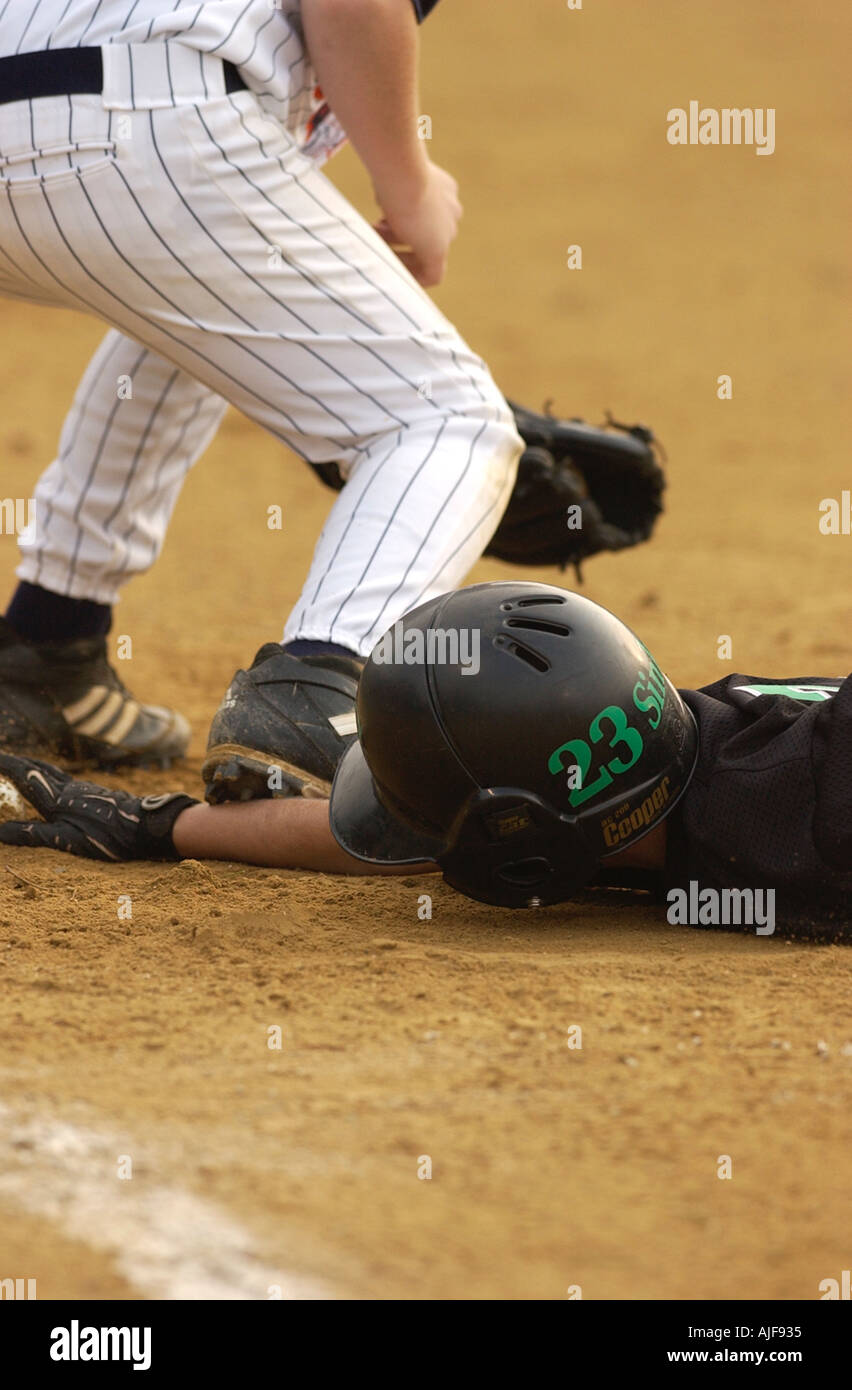 Youth baseball action Stock Photo - Alamy