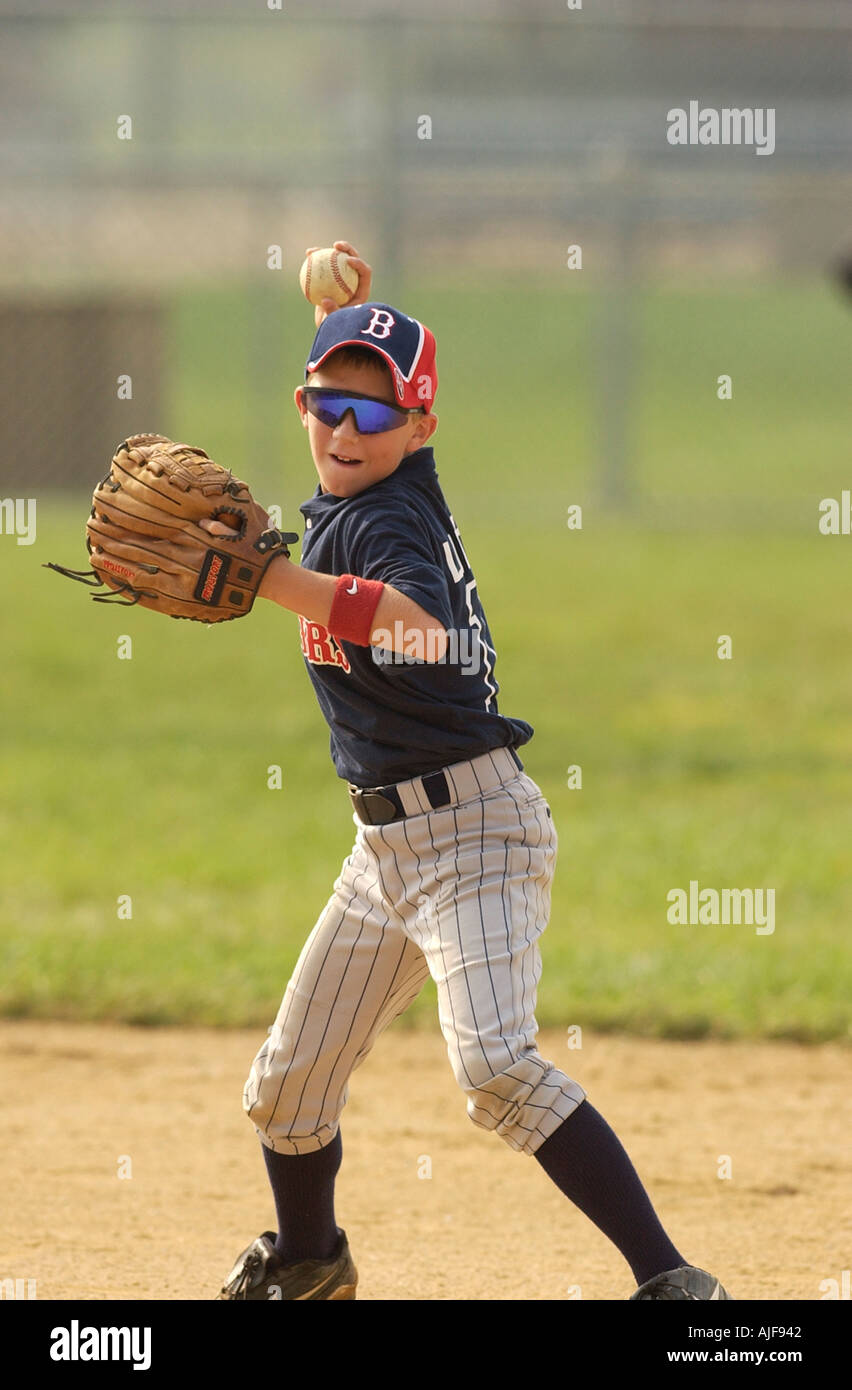 Youth baseball action Stock Photo - Alamy