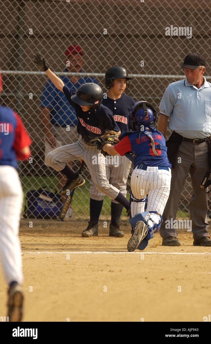 Youth baseball action Stock Photo - Alamy