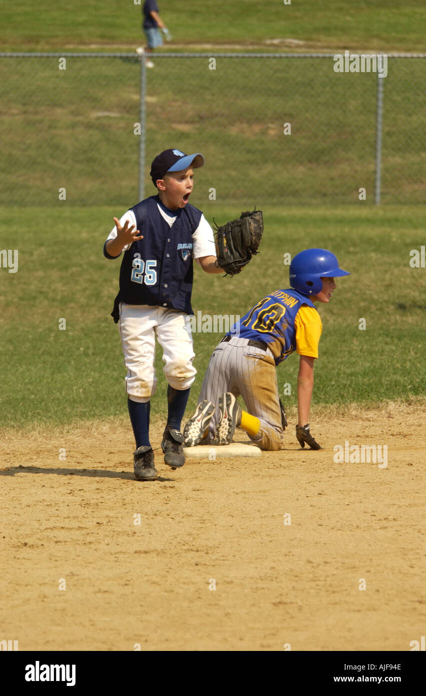 Youth baseball action Stock Photo - Alamy