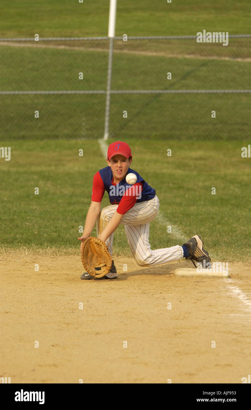Youth baseball action Stock Photo - Alamy