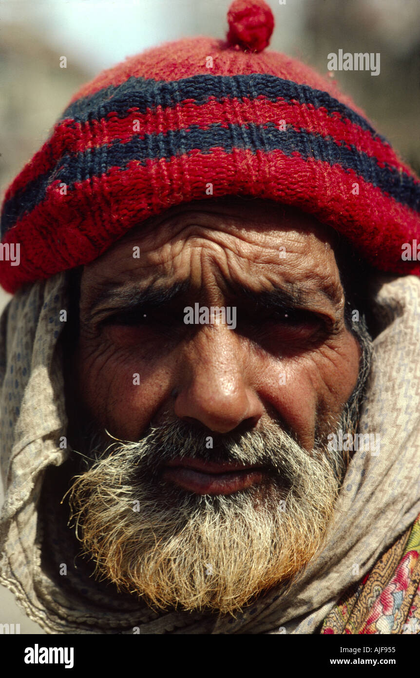Pakistan man with white beard and colourful hat Stock Photo - Alamy