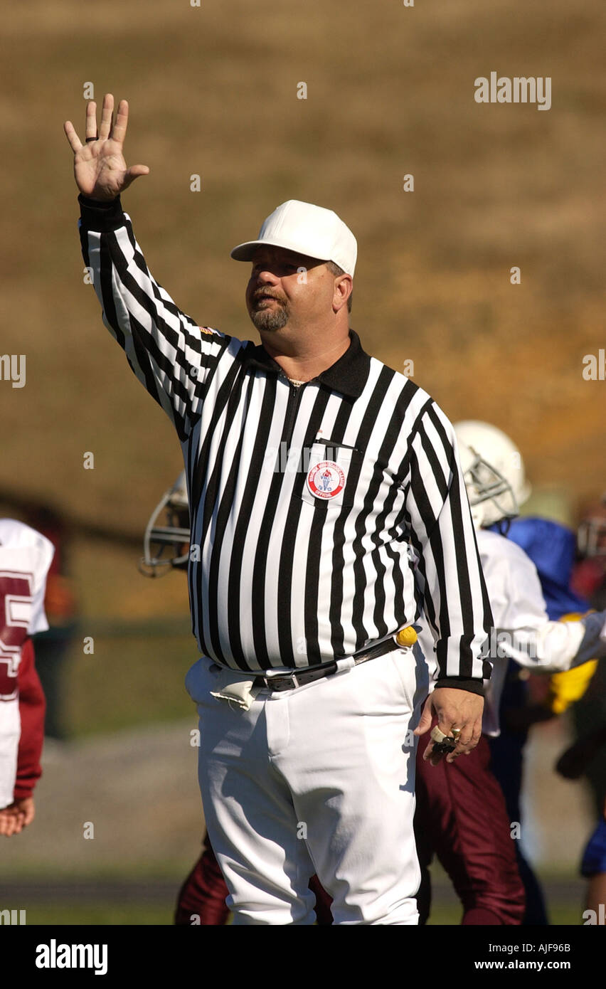 Kid american football line of scrimmage hi-res stock photography and ...