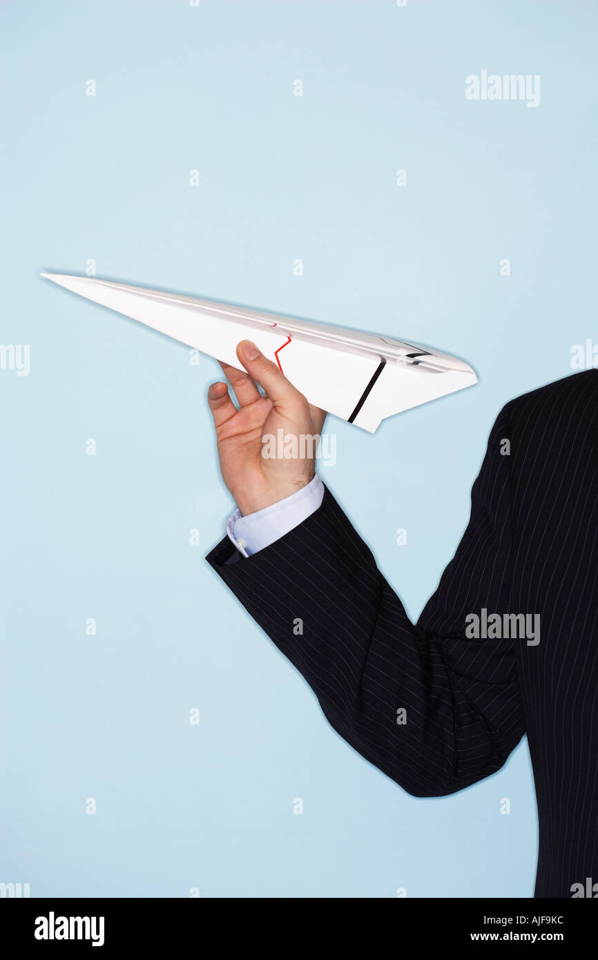 Businessman throwing paper airplane hi-res stock photography and images ...