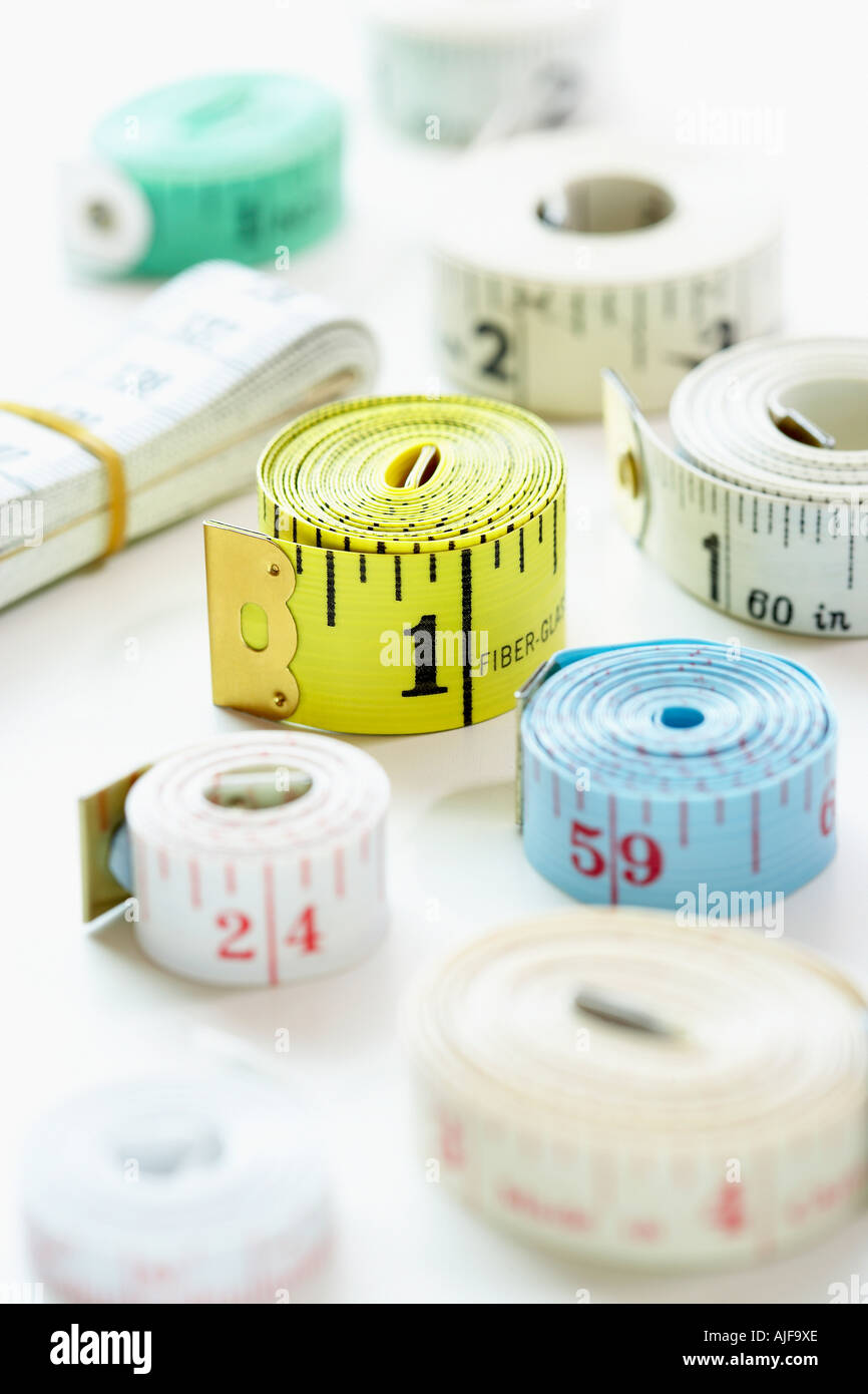 Rolls of measuring tape, close-up Stock Photo - Alamy