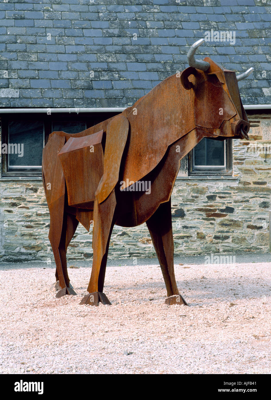 A rusted metal sculpture of a Devon Ox in the Ox Yard at Buckland Abbey ...