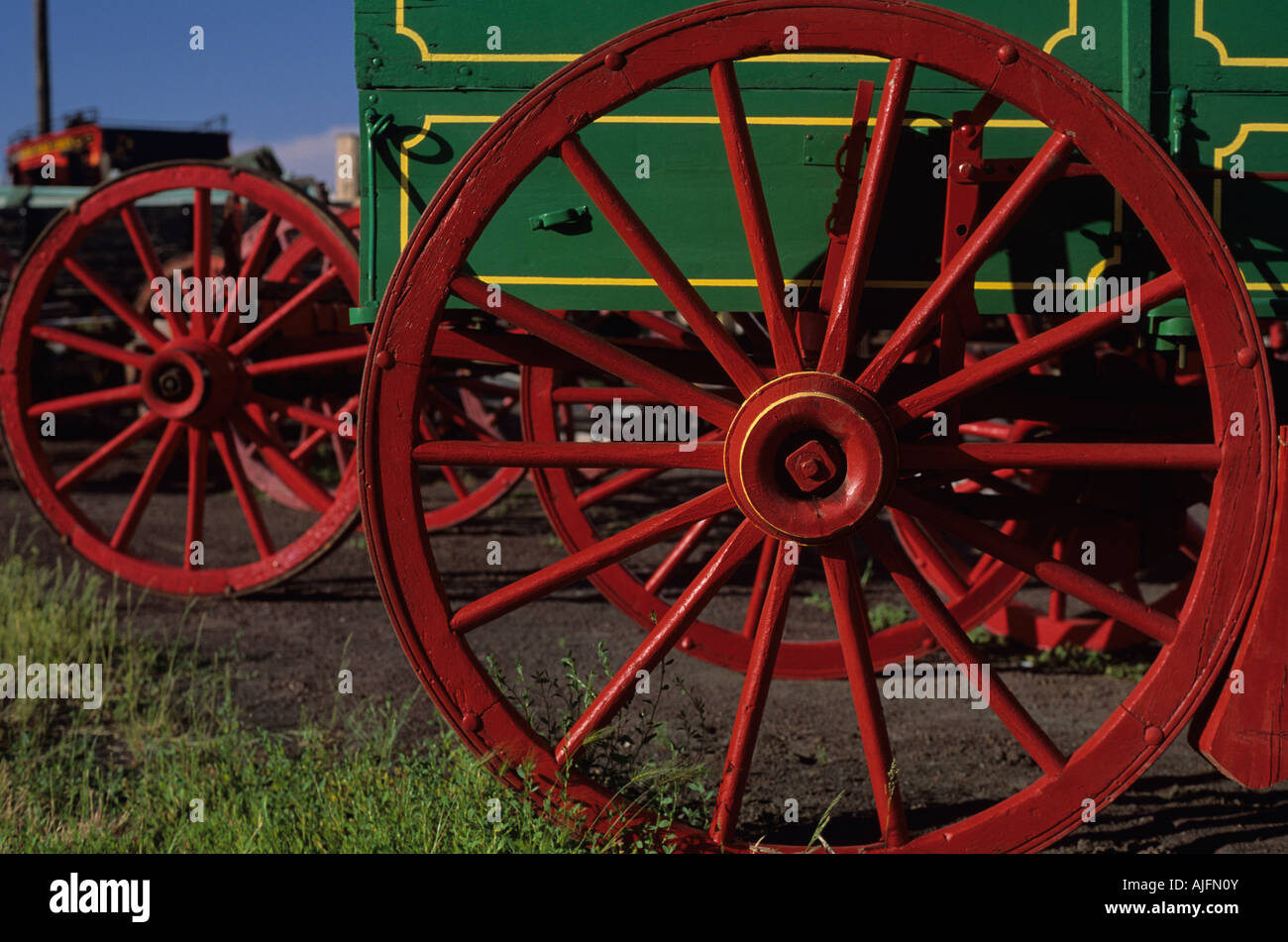 Carriage wagon bright red wheels close up in the ghost town of Shaniko ...