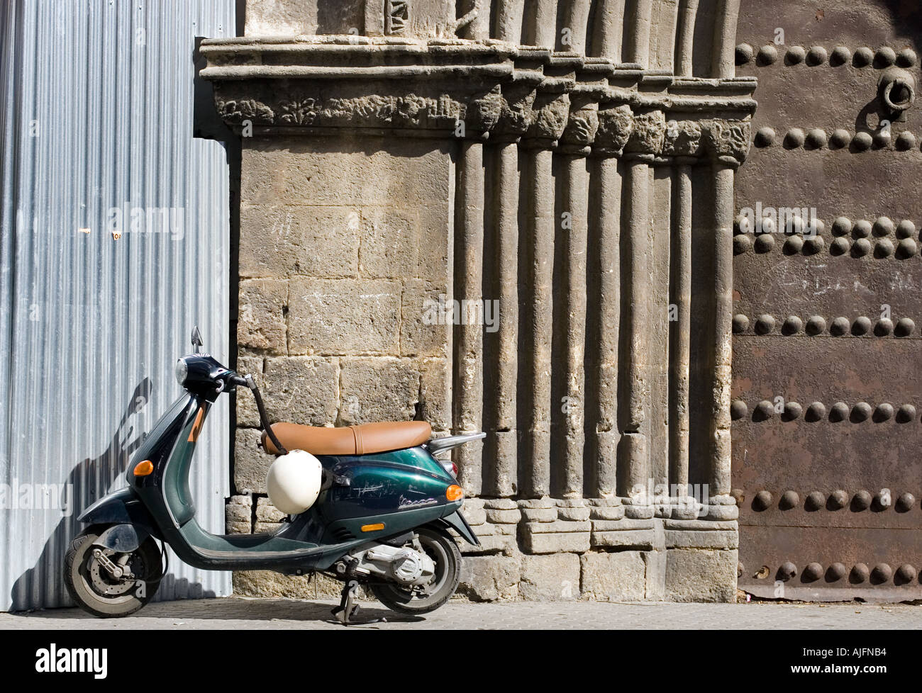 Old and new Gothic church and scooter Stock Photo - Alamy