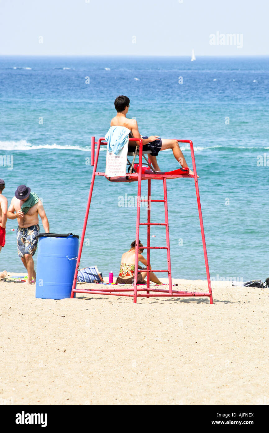 Lifeguard in his watchtower at the beach Stock Photo - Alamy