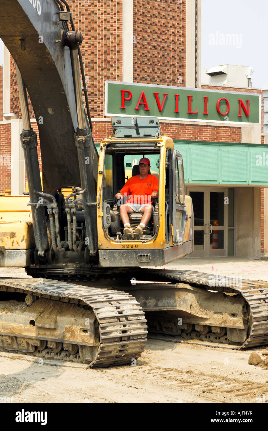 Operator working his digger at a resurfacing project in Port Huron ...