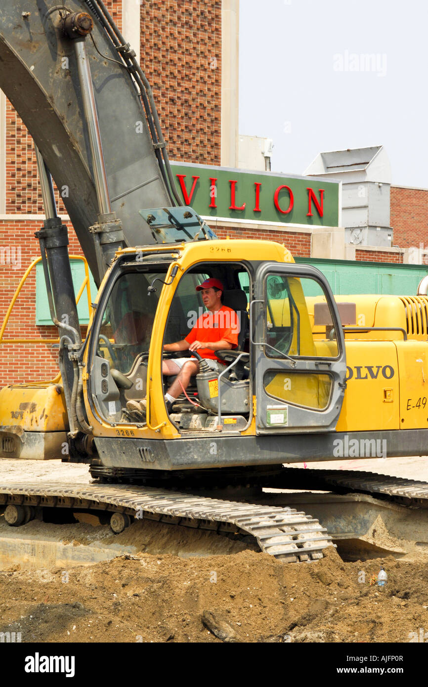 Operator working his digger at a resurfacing project in Port Huron ...