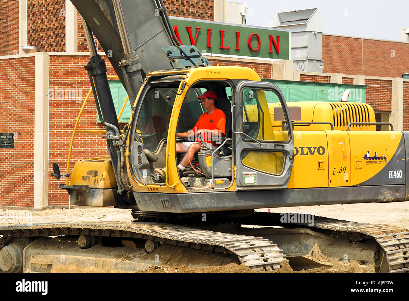 Operator working his digger at a resurfacing project in Port Huron ...