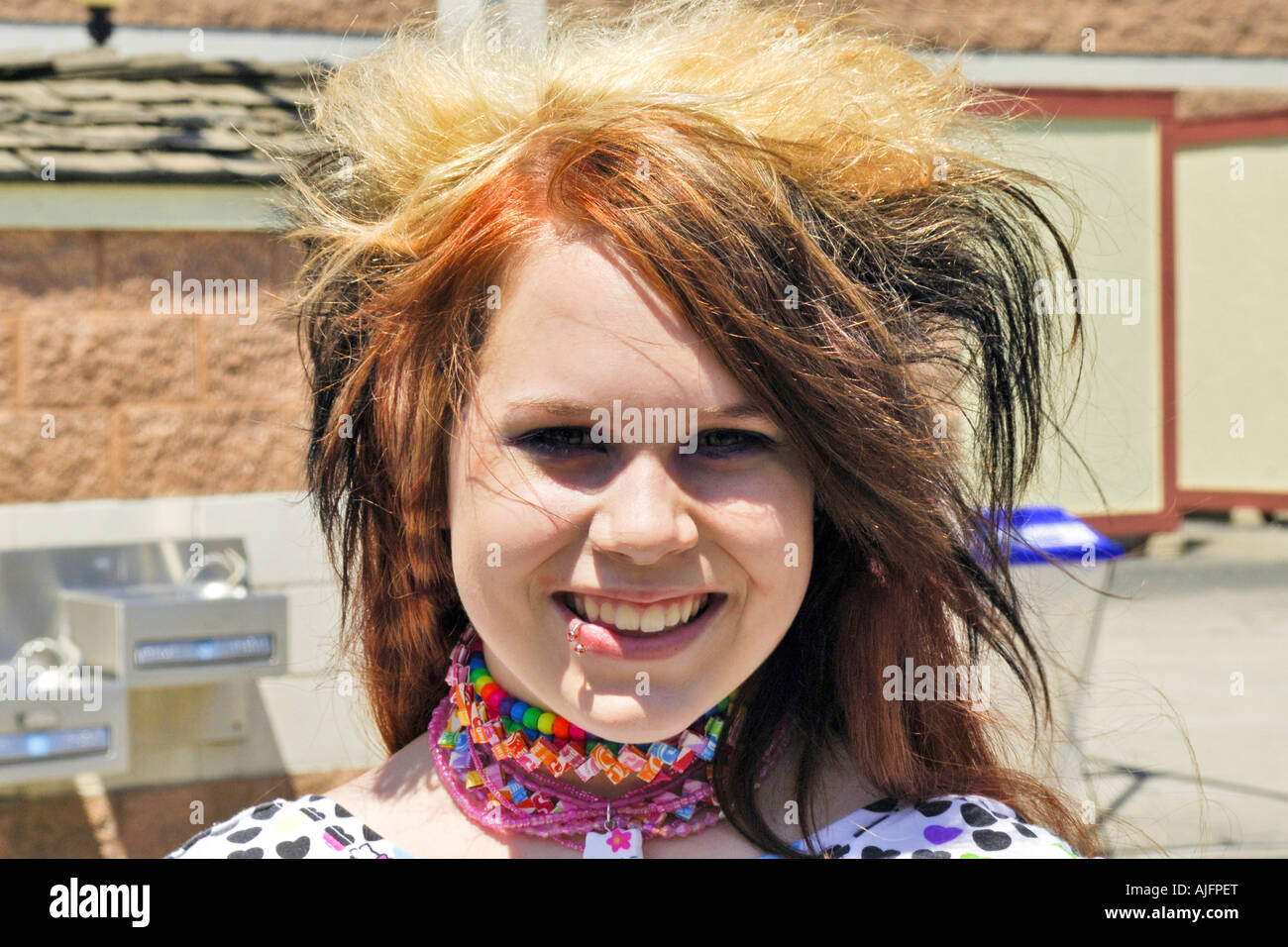 Teenage Girl with a Punk Rock hair style and Lip ring Stock Photo - Alamy