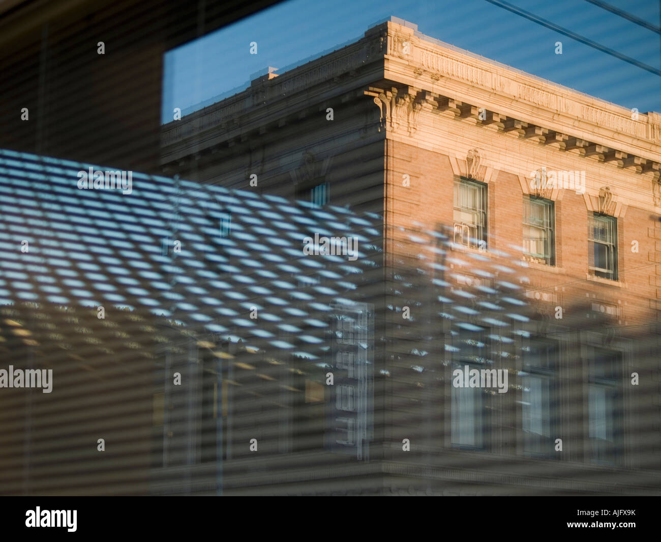 Reflections in storefront windows Stock Photo - Alamy