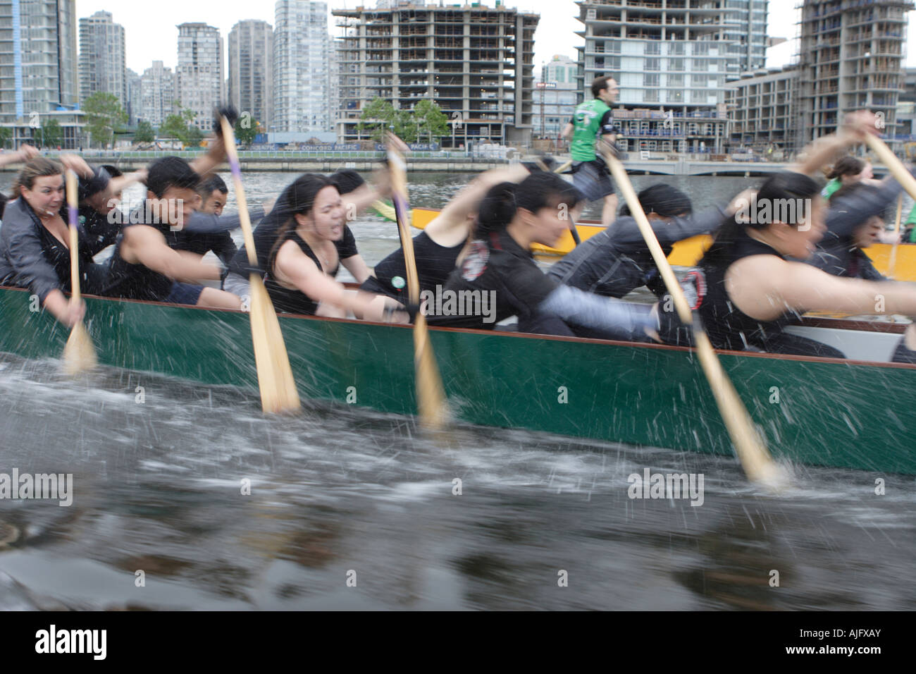 Team dragon boat racing, working together Stock Photo - Alamy