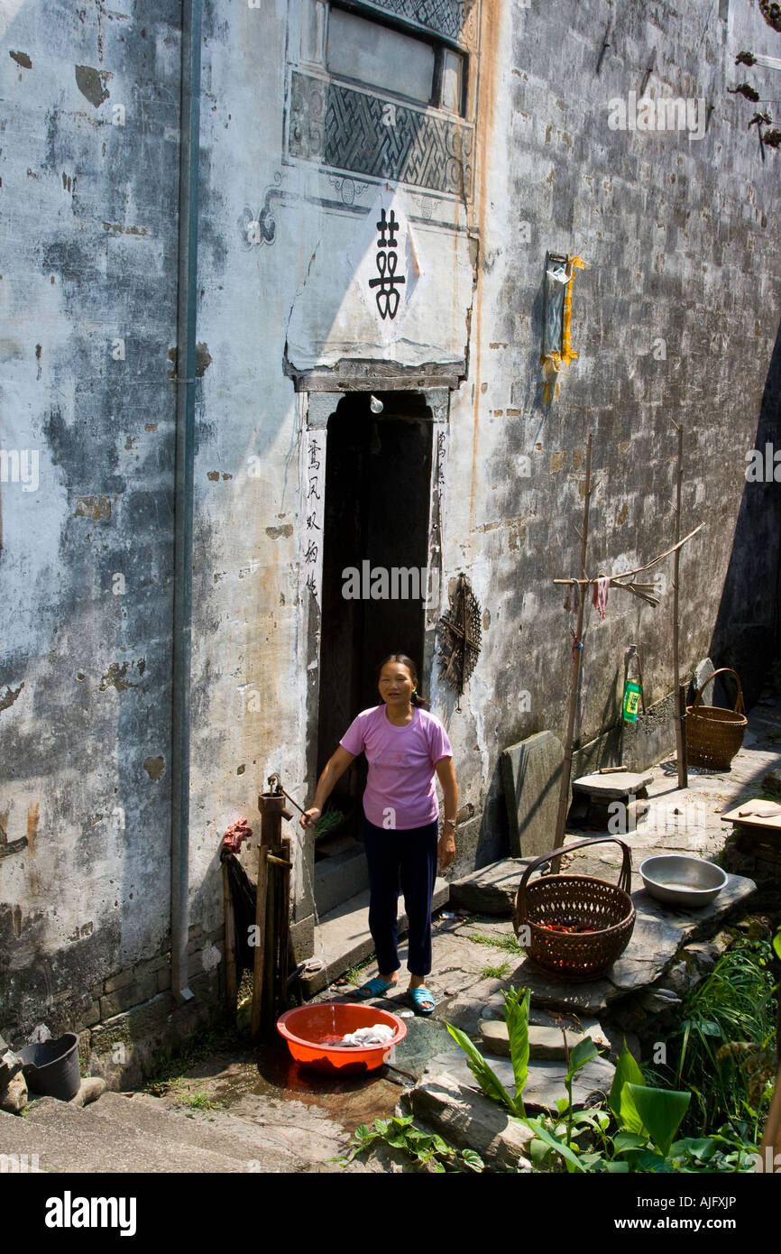Woman Handwashing Clothes Likeng Wuyuan County China Stock Photo - Alamy