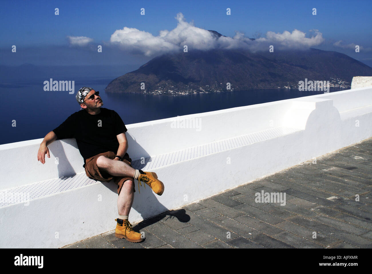 Sunbathing at the Church of Chiesa Vecchia on the island of Lipari ...