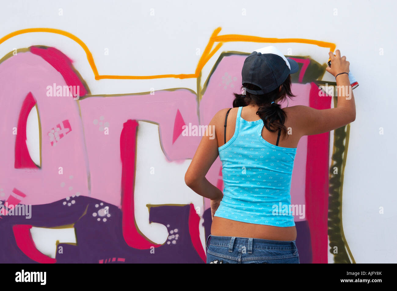 Female Graffiti artist taking part in competition Stock Photo - Alamy