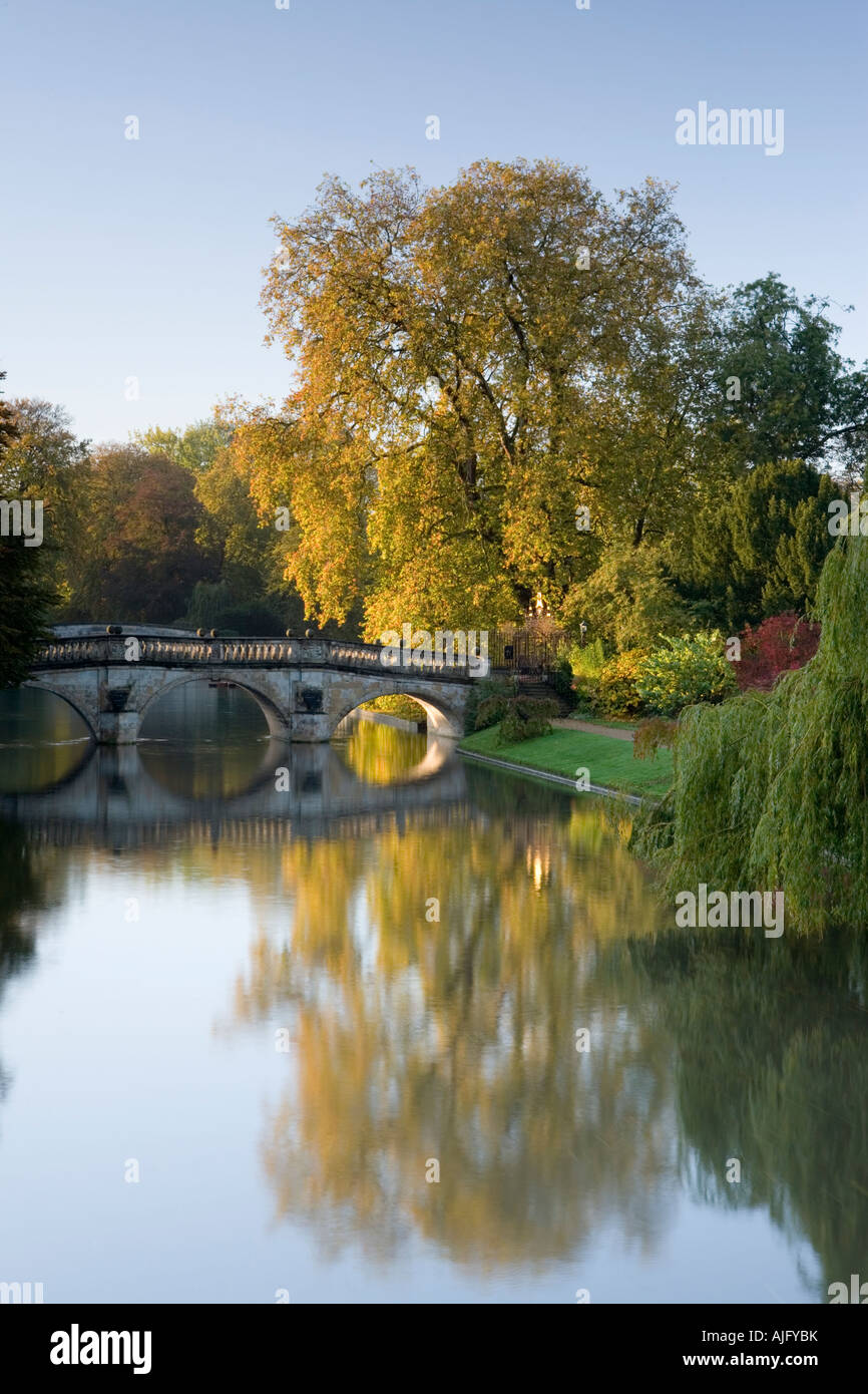 Ancient Clare bridge with autumn colours and reflections bathed in ...
