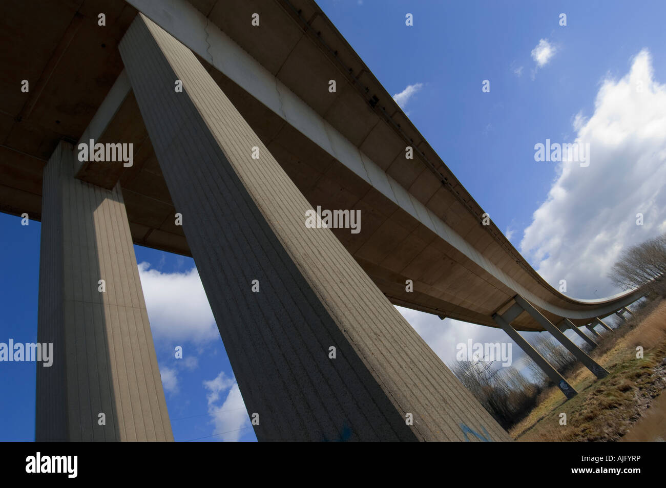 Motorway freeway overpass above river Stock Photo - Alamy