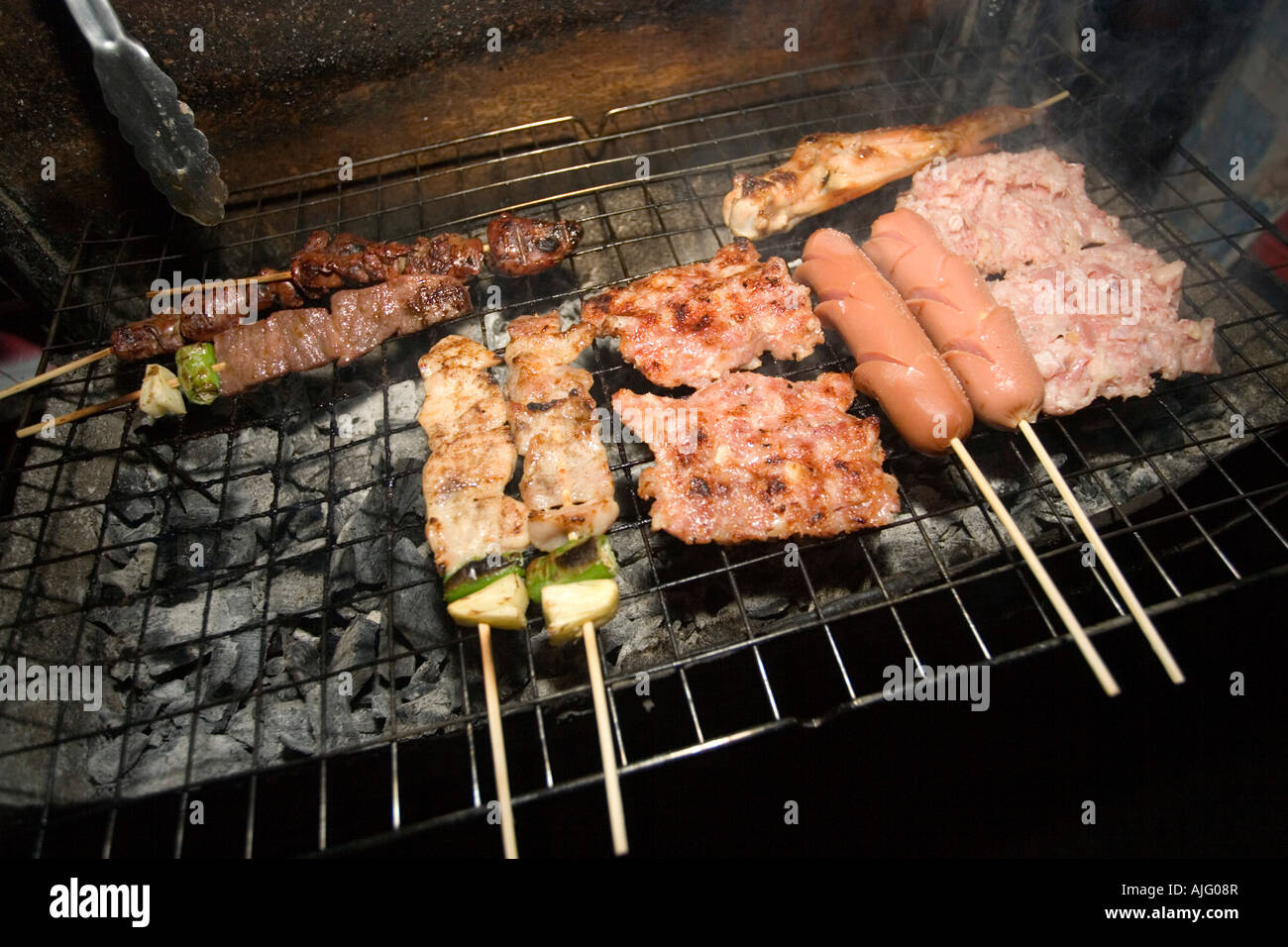 Night time road side barbecue popular holiday spot Karon Beach Phuket ...