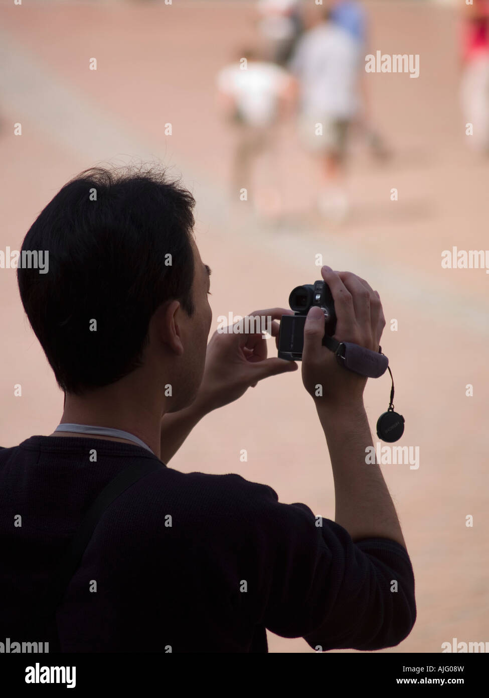 Video camera behind hi-res stock photography and images - Alamy