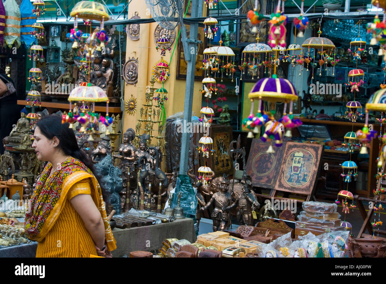 Indian Woman in front of a Hindu Souvenir Shop Little India Singapore ...